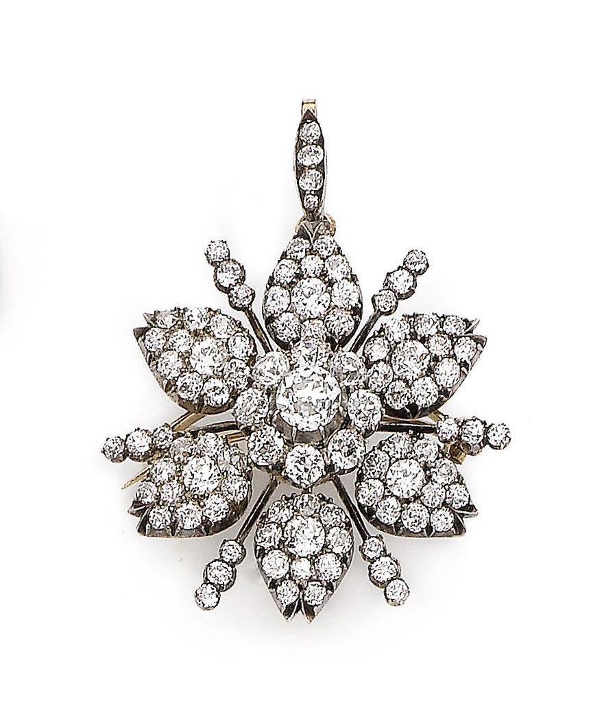 Bonhams : A diamond flower brooch,