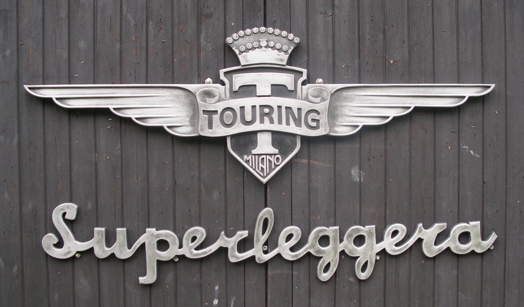 Bonhams Cars : DEUX EMBLEMES DECORATIFS DE GARAGE « TOURING MILANO » ET ...