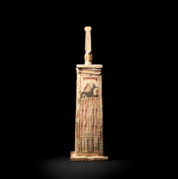 Bonhams : An Egyptian polychrome painted wood canopic jar box