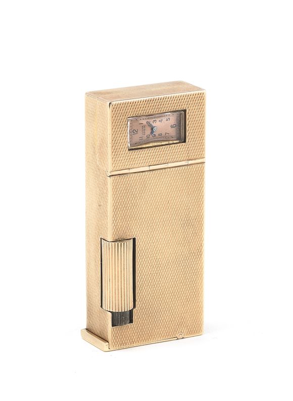 Bonhams : Lusina, Geneve. A 9ct gold timepiece set in a lighter case ...