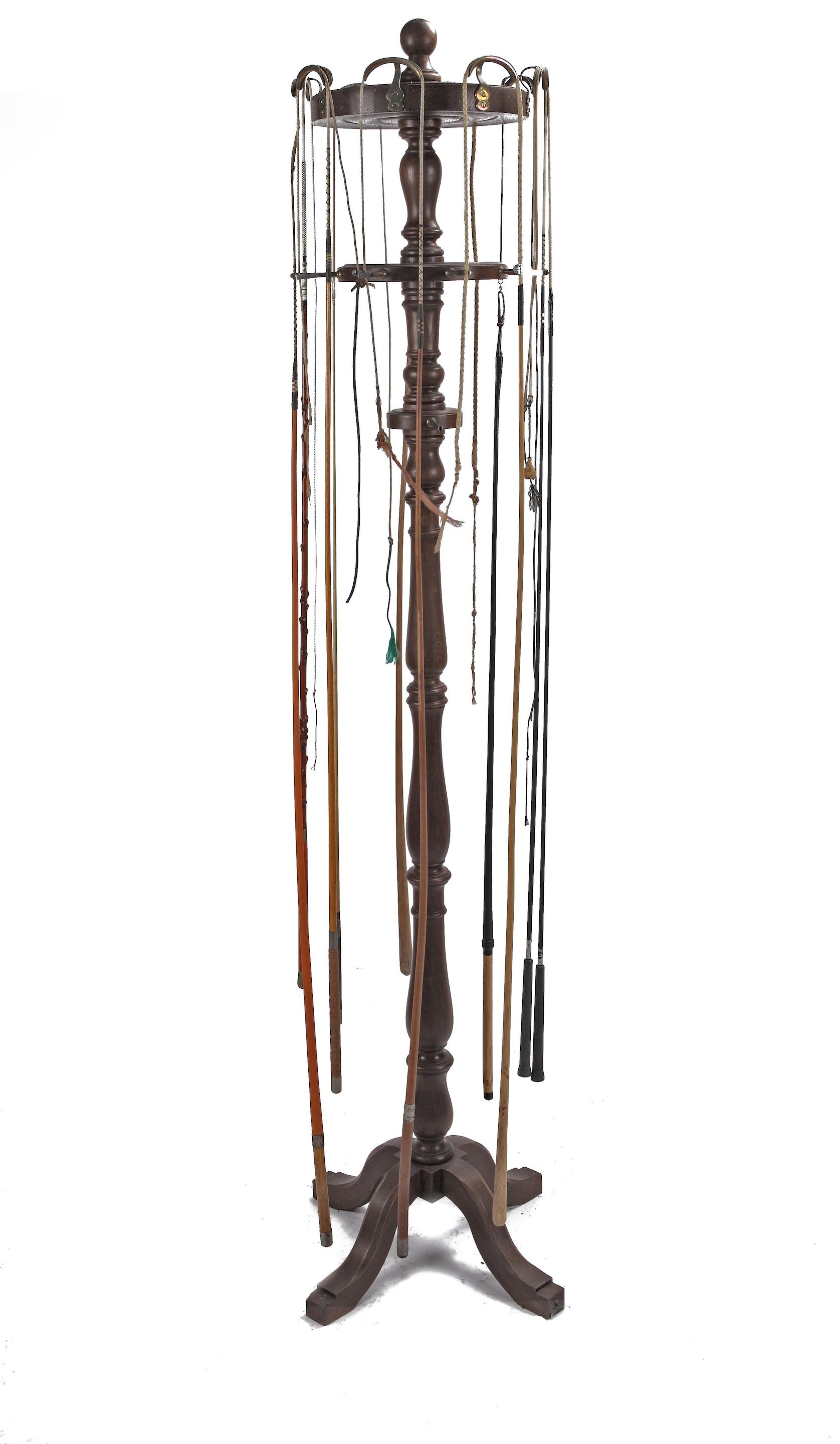 Bonhams Cars : A large circular whip stand,