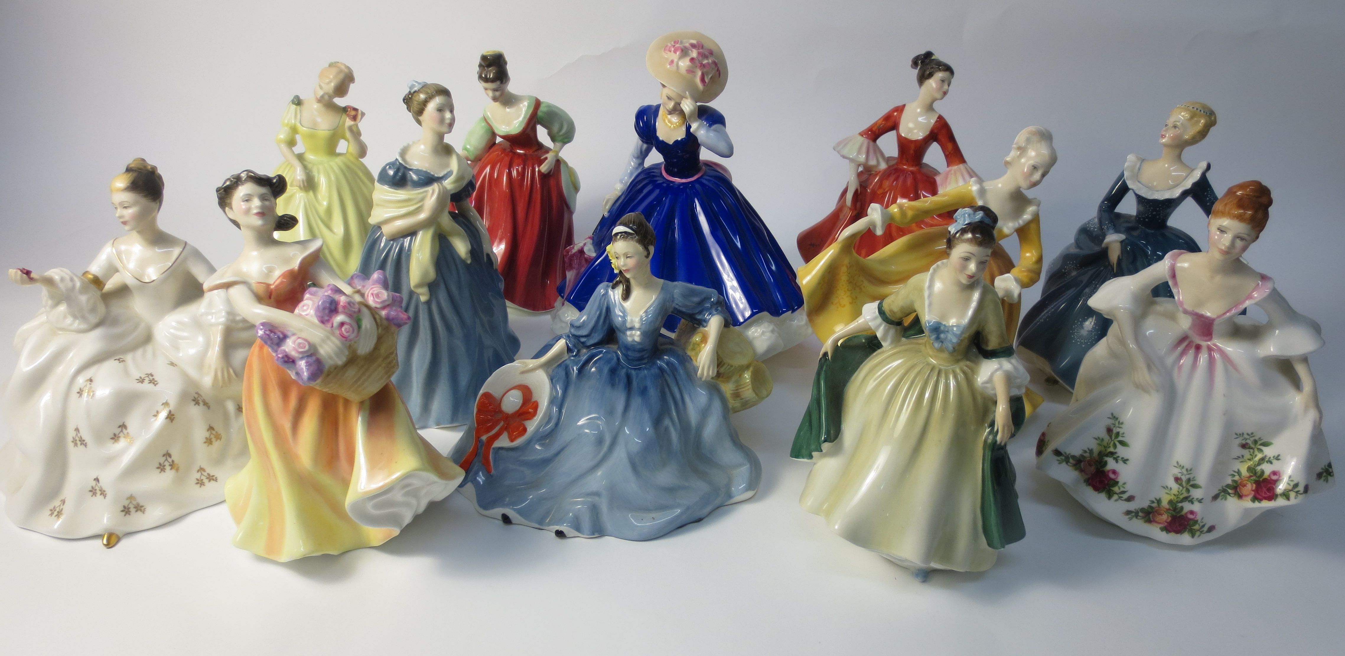 Bonhams : Twelve Royal Doulton lady figures