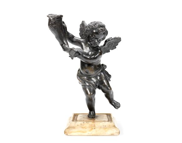 Bonhams : An 18th century Italian bronze figure of a Putto with a dolphin