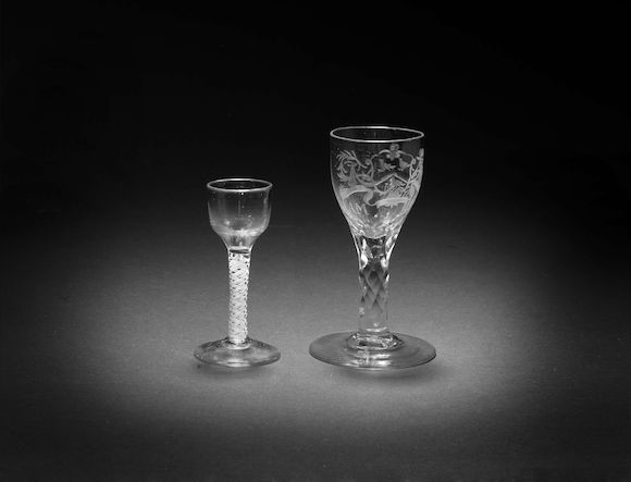 Bonhams : An armorial dram glass and an unusual miniature or toy wine ...