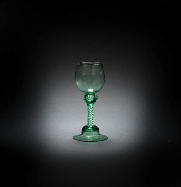 Bonhams A Rare Green Tinted Opaque Twist Wine Glass Circa 1760 70