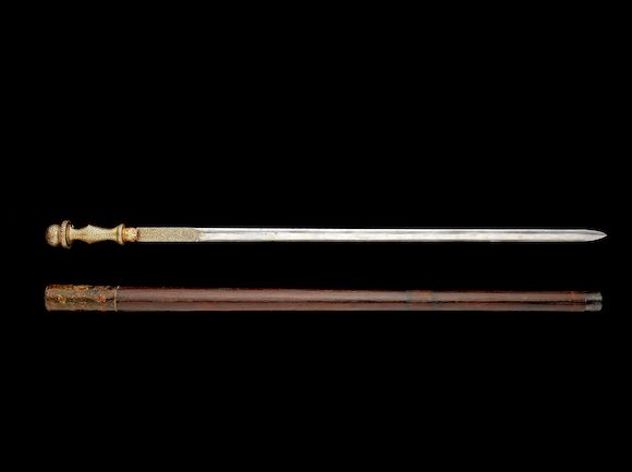 Bonhams : A gold damascened steel and wood staff Gupti with tiger head ...