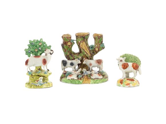 Bonhams : A rare Staffordshire spill vase, a model of a sheep and a ...