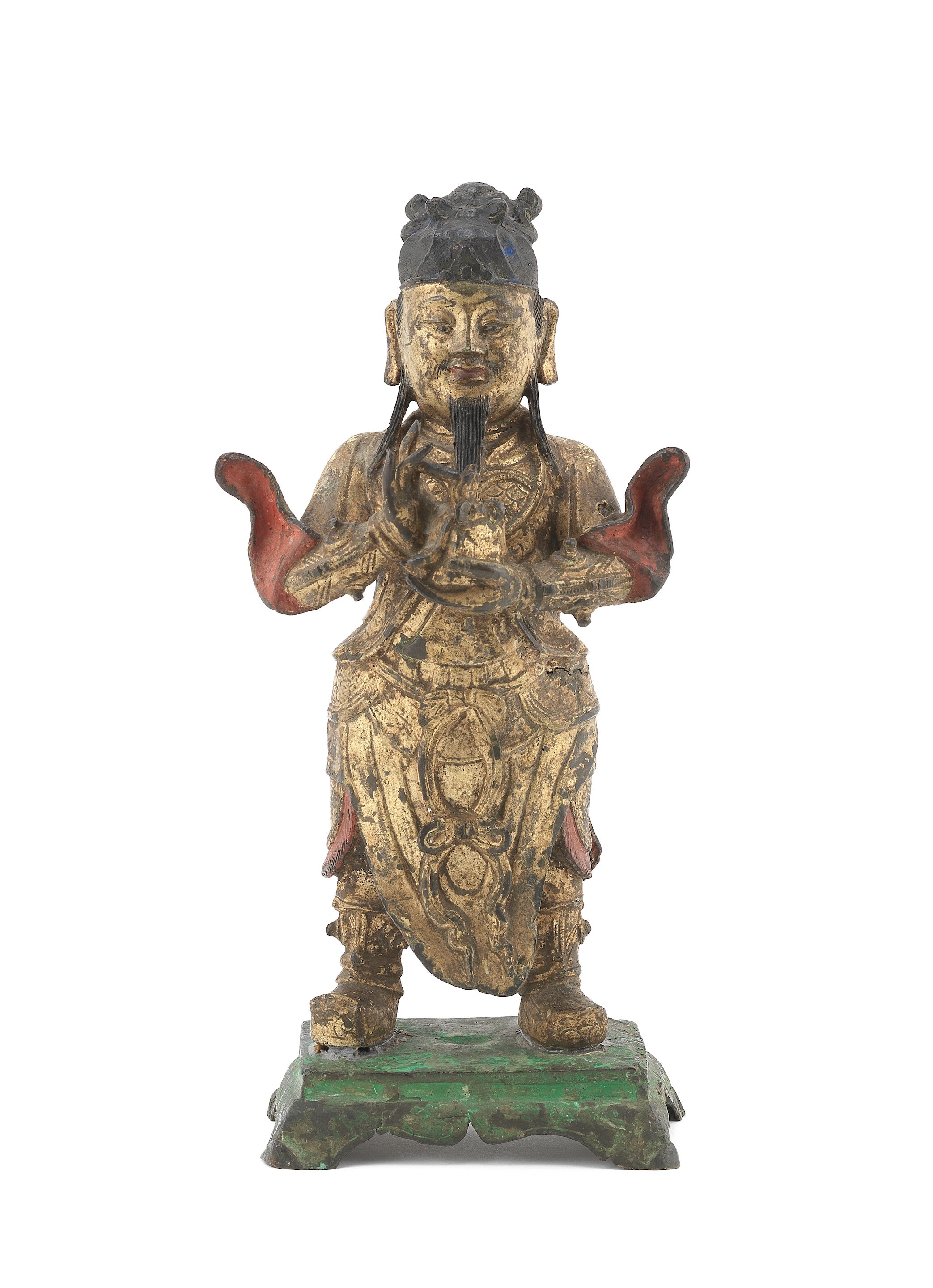 Bonhams : A painted and gilt bronze model of a Daoist Immortal Ming Dynasty