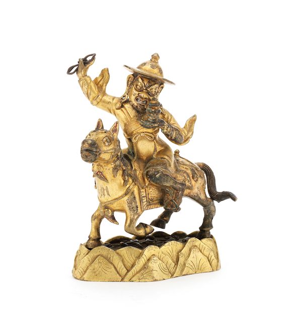 Bonhams : A gilt-bronze figure of Yonten Gyalpo 18th century (2)