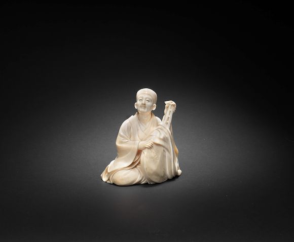 Bonhams : An ivory figure okimono probably representing a biwa hoshi ...