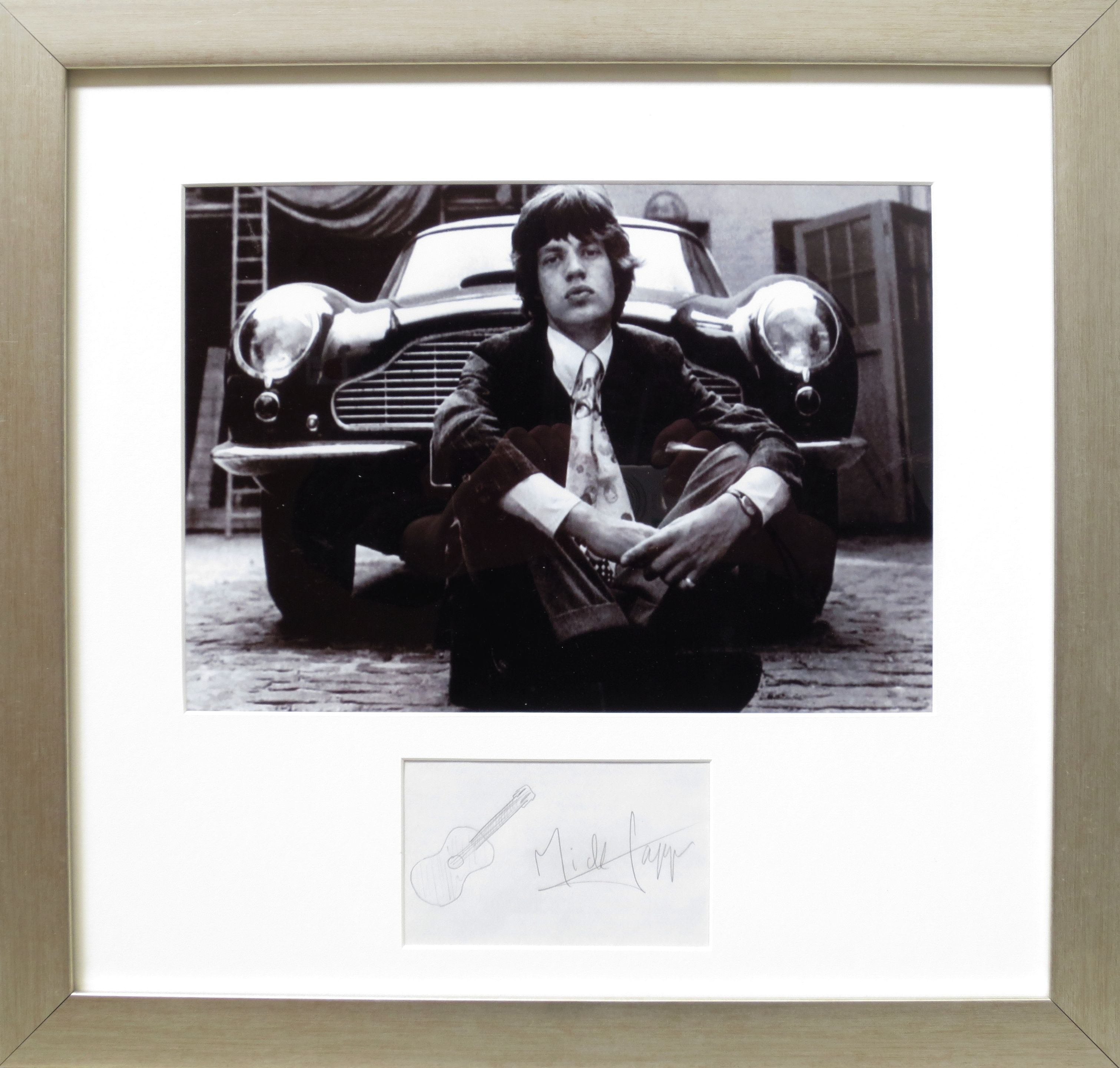 Bonhams Cars : A framed photograph with signature of Mick Jagger and ...