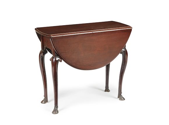 Bonhams : An 18th Century Irish mahogany drop leaf table, the moulded ...