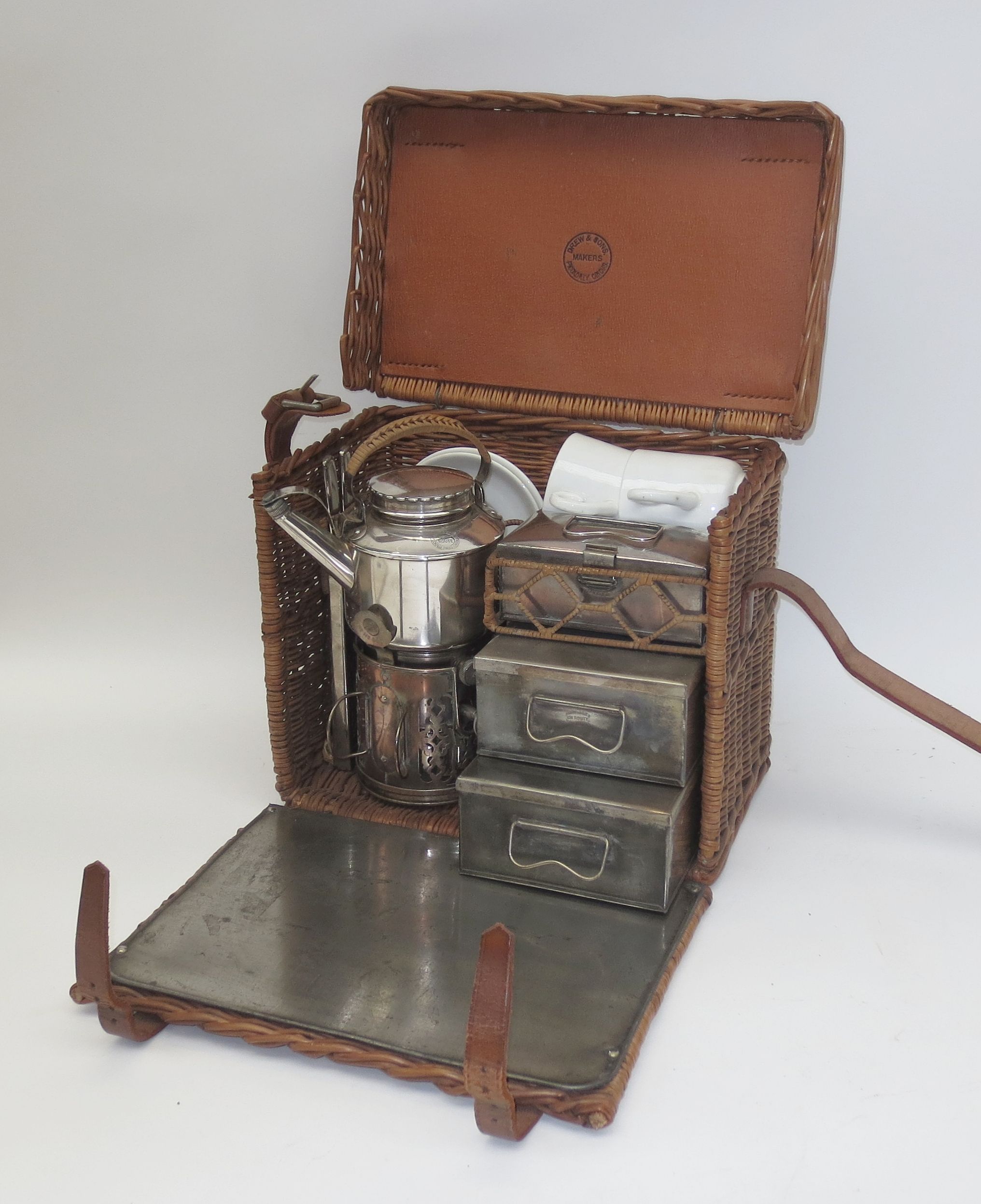 Bonhams Cars : A wicker-cased 'En Route' tea set for two persons, by ...