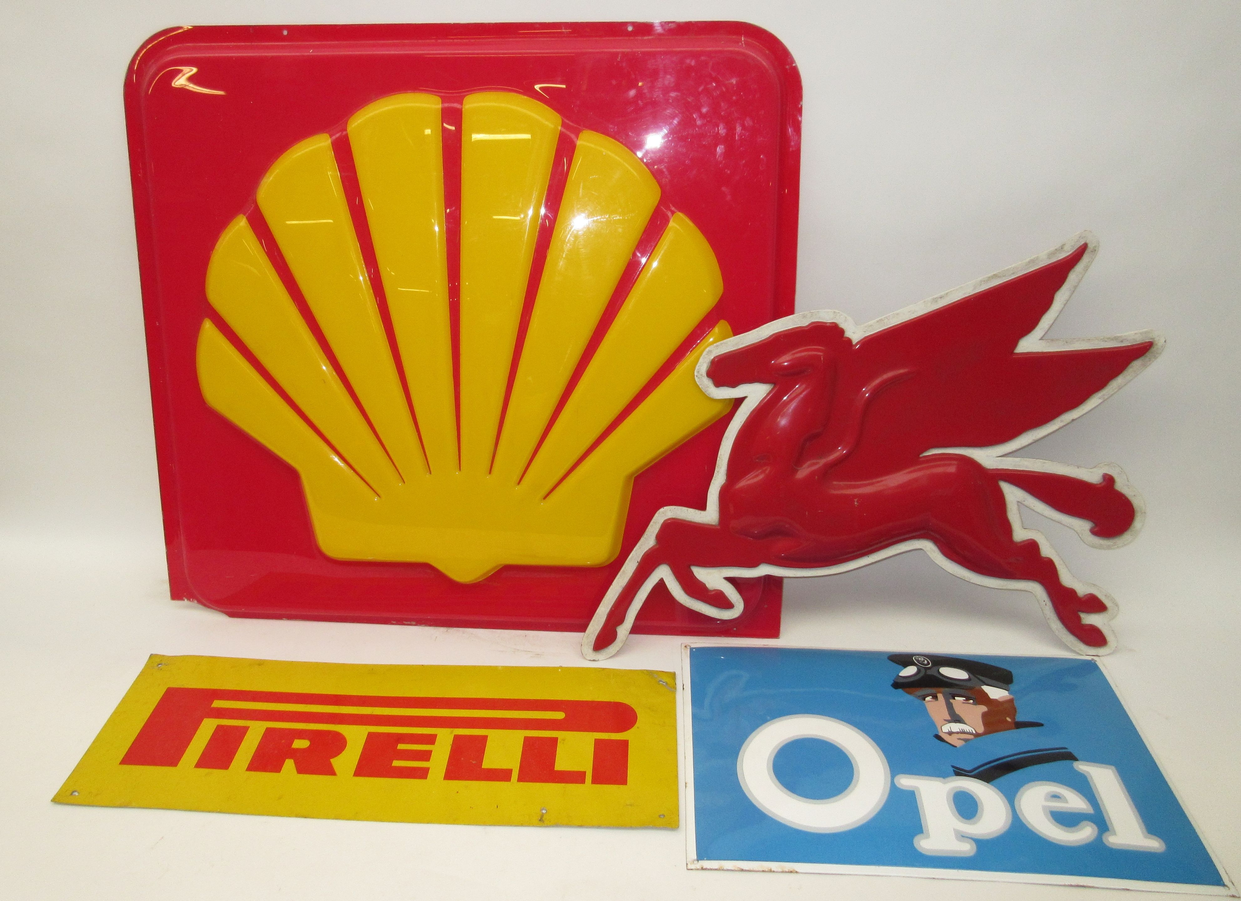 Bonhams Cars : A replica Opel enamel advertising sign and other garage ...