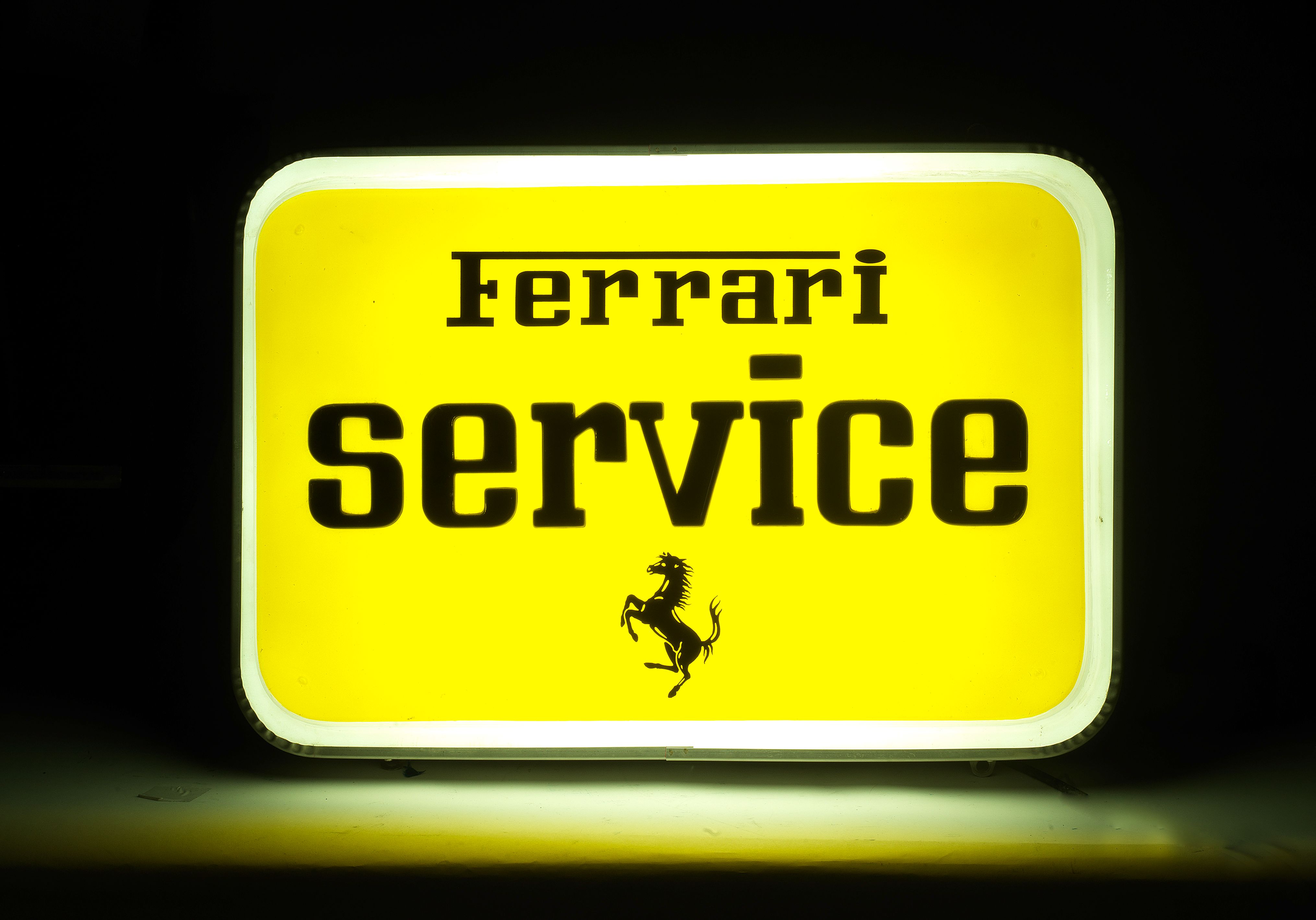 Bonhams Cars : A Ferrari Service illuminated sign,