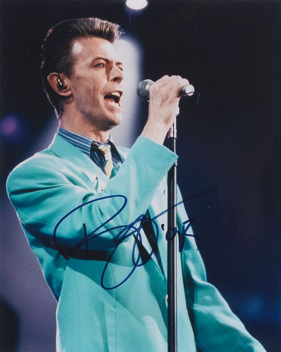 Bonhams : David Bowie: Three colour photographs of David Bowie signed ...