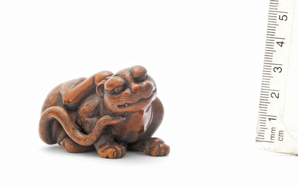 Bonhams : A wood netsuke of a tiger Kyoto style, 19th century