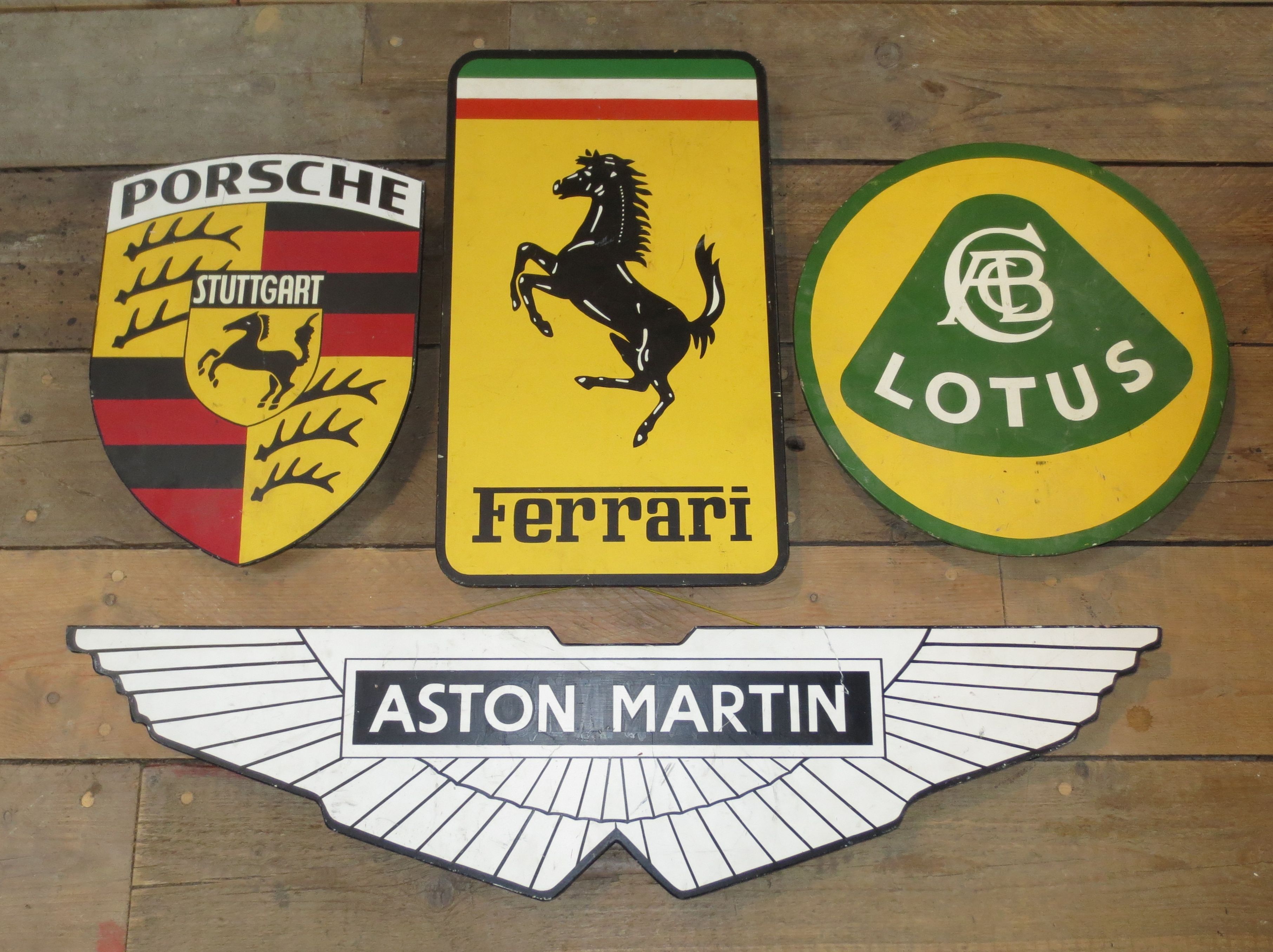 Bonhams Cars : Four Painted Marque Emblems for Garage Display, ((4))