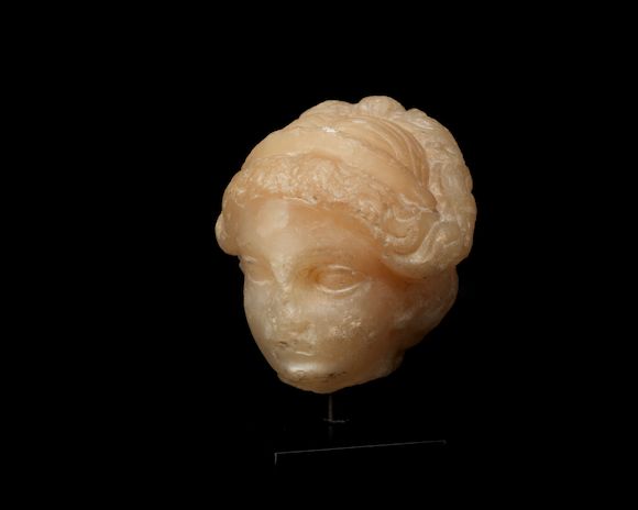 Bonhams : A Hellenistic alabaster head of a young woman
