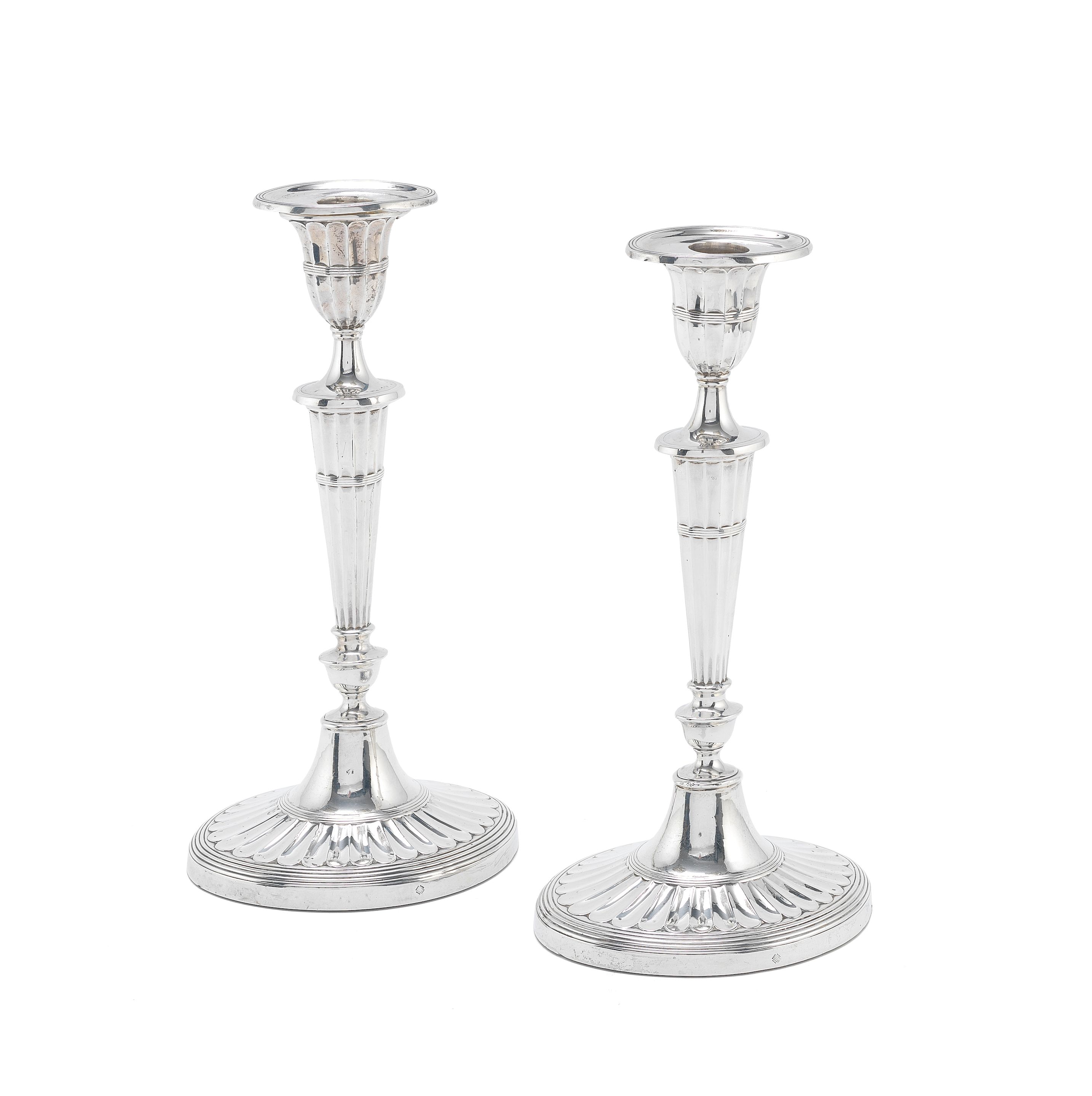 Bonhams : A pair of Edwardian silver candlesticks by William Hutton ...