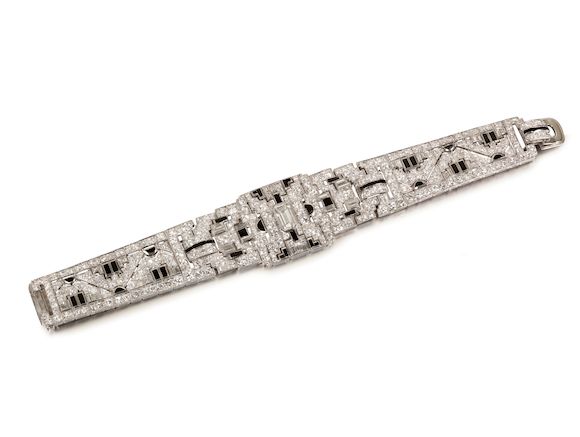 Bonhams : An Art Deco onyx and diamond bracelet,
