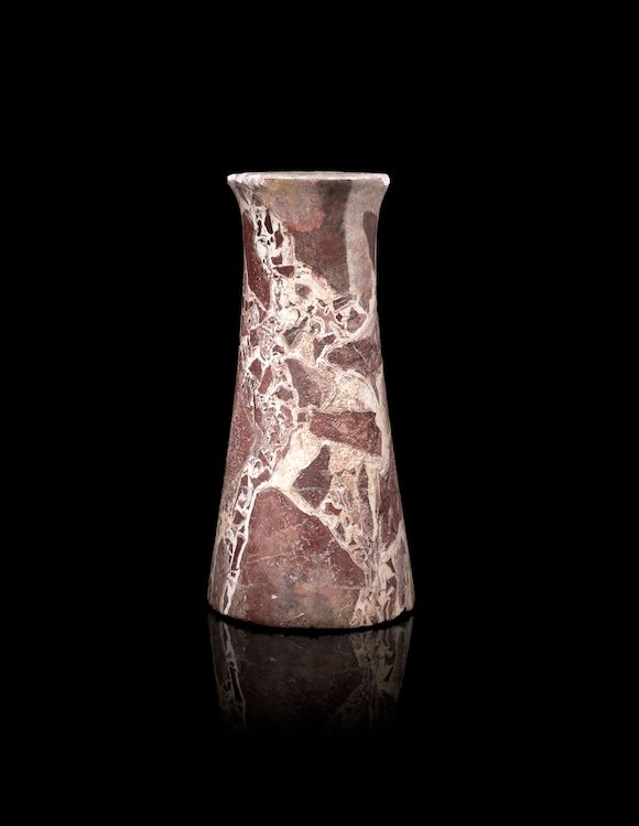 Bonhams : A Bactrian red stone ritual object