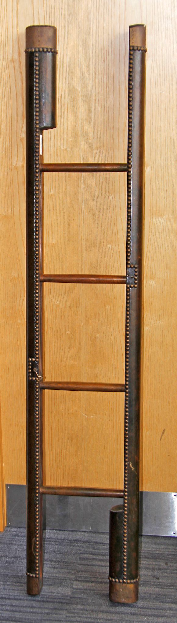Bonhams : A leather and brass studded folding library ladder