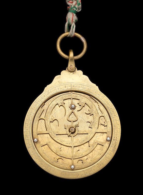 Bonhams : A small brass copy of a 16th century Ottoman astrolabe,