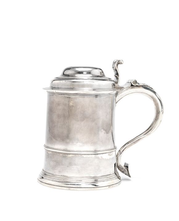 Bonhams : A George II silver lidded tankard By William Darker, London 1730