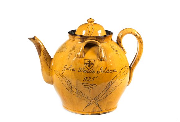 Bonhams : A massive slipware teapot and cover, dated 1885