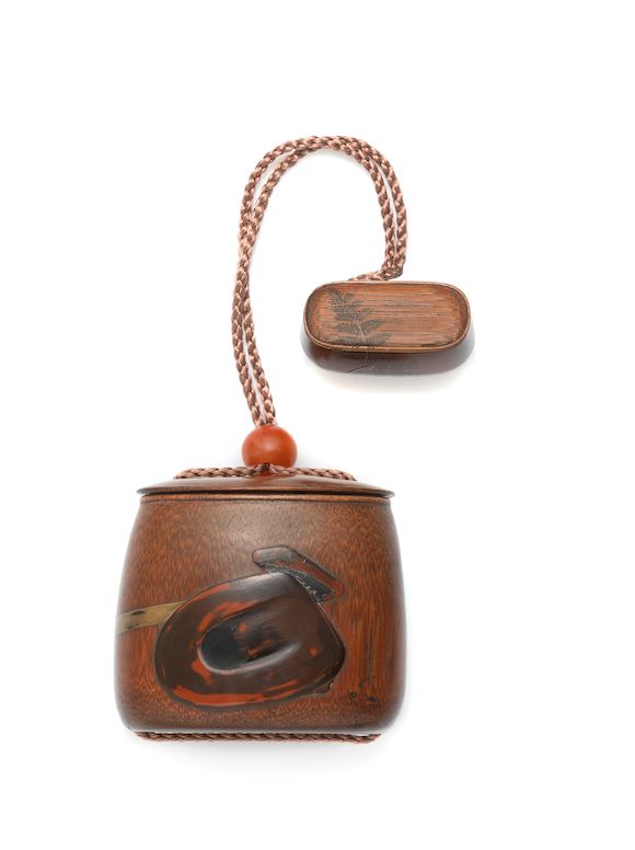 Bonhams : A tabako-ire (tobacco box) and netsuke with design of writing ...
