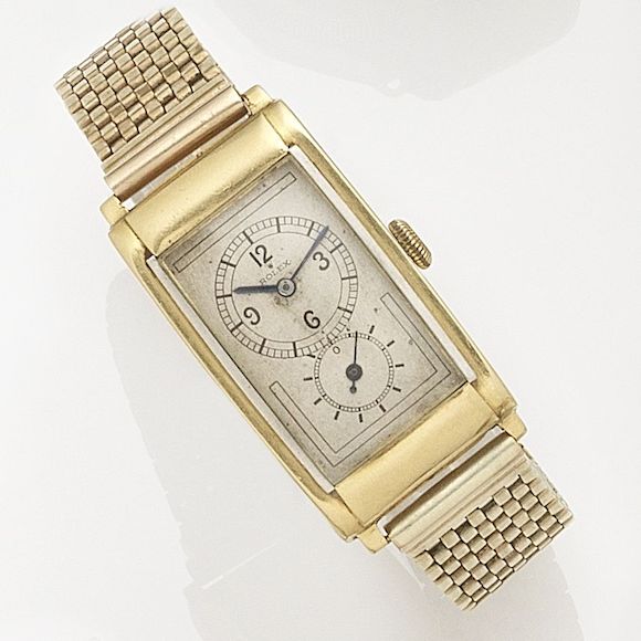 Bonhams : Rolex. A fine and rare two colour 18K gold manual wind ...