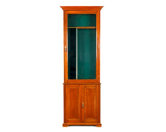 Bonhams : A late Victorian oak gun cabinet by Army & Navy C.S.L.