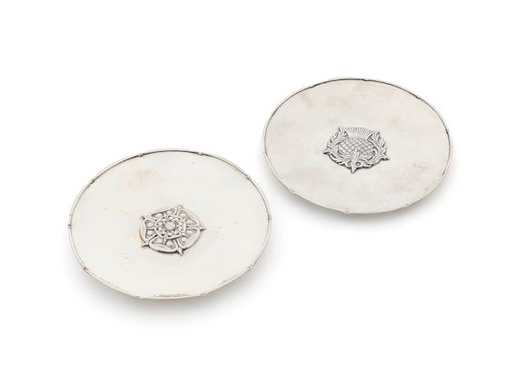 Bonhams : OMAR RAMSDEN: A matched pair of silver 'Tudor Rose' dishes ...