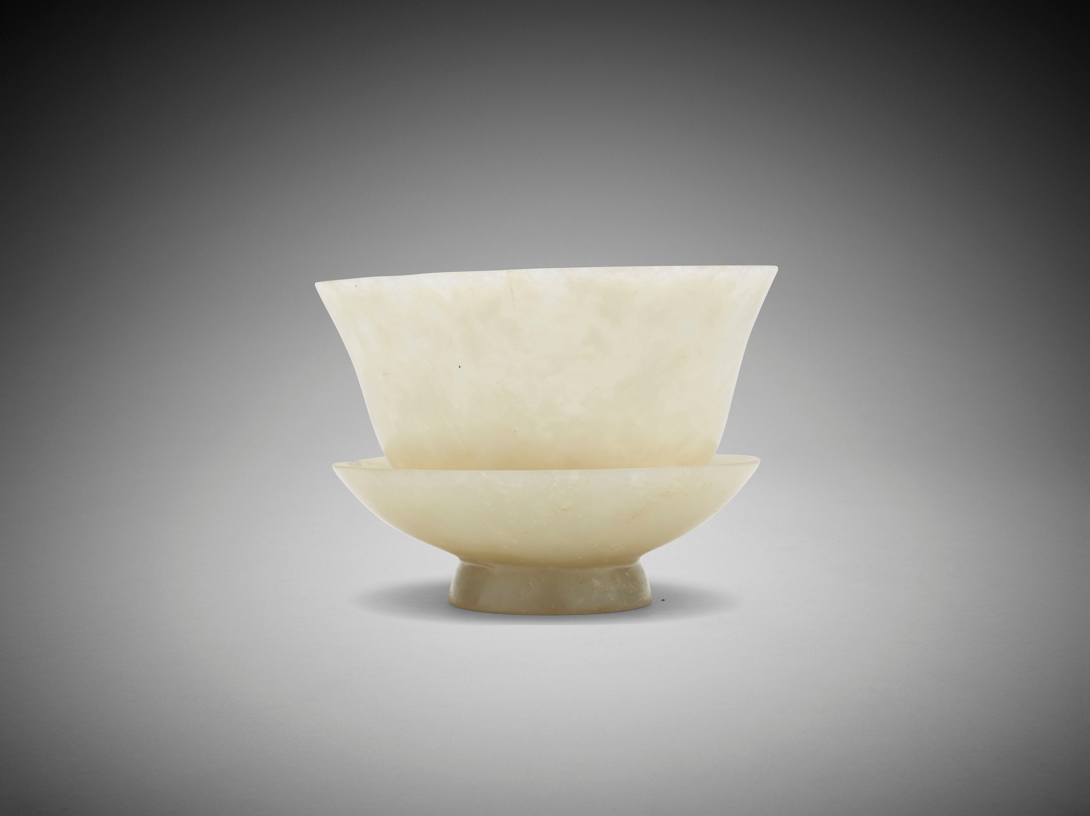 Bonhams : A caved jade tea cup with cover