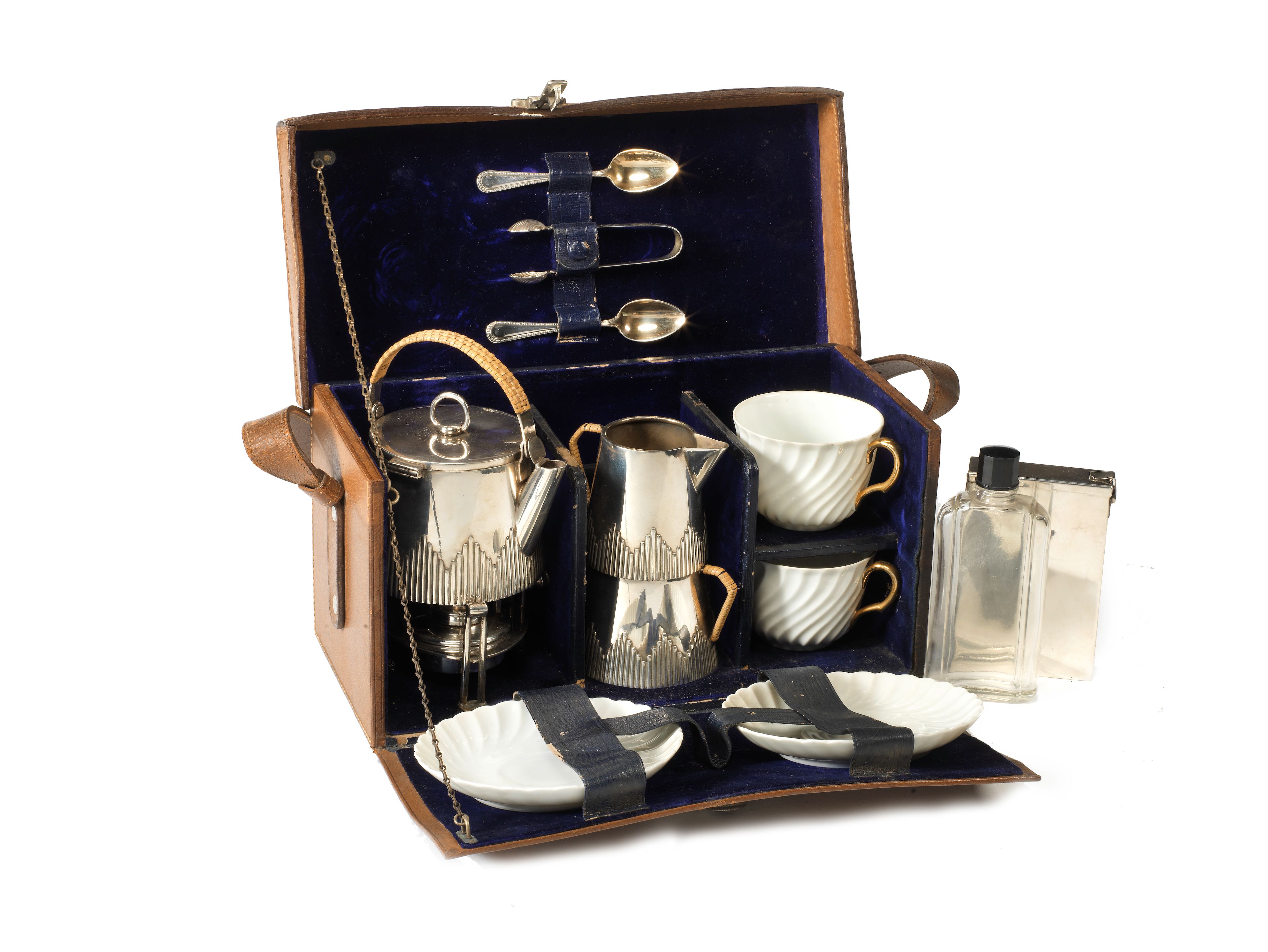 Bonhams Cars : A leather-cased travelling tea-set for two persons ...