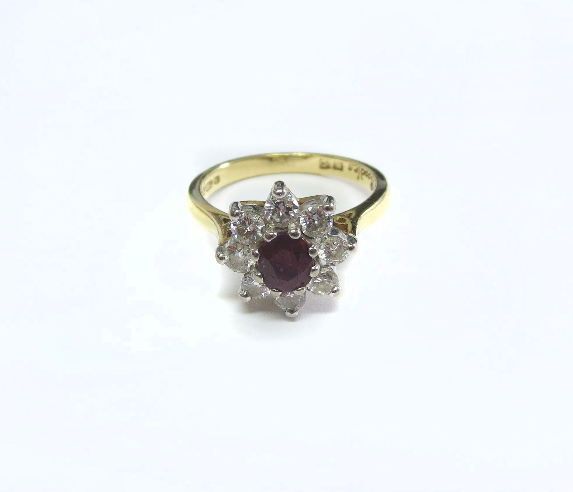 Bonhams : An 18ct gold ruby and diamond cluster ring, by Boodles