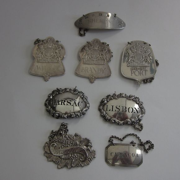 Bonhams : Eight silver wine labels various dates and makers (8)