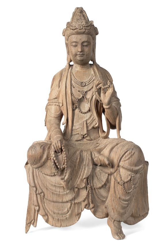 Bonhams : A Chinese camphor wood figure of Guanyin 20th century