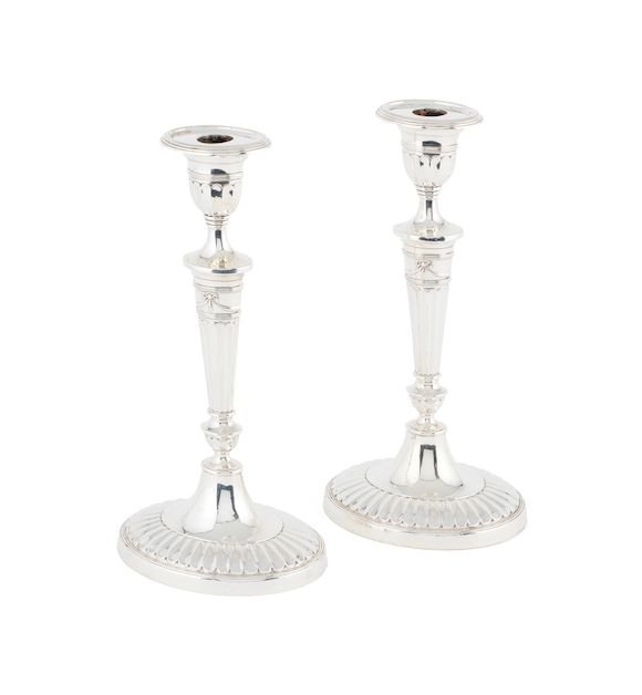 Bonhams : A pair of silver candlesticks by Holland, Aldwinckle & Slater ...