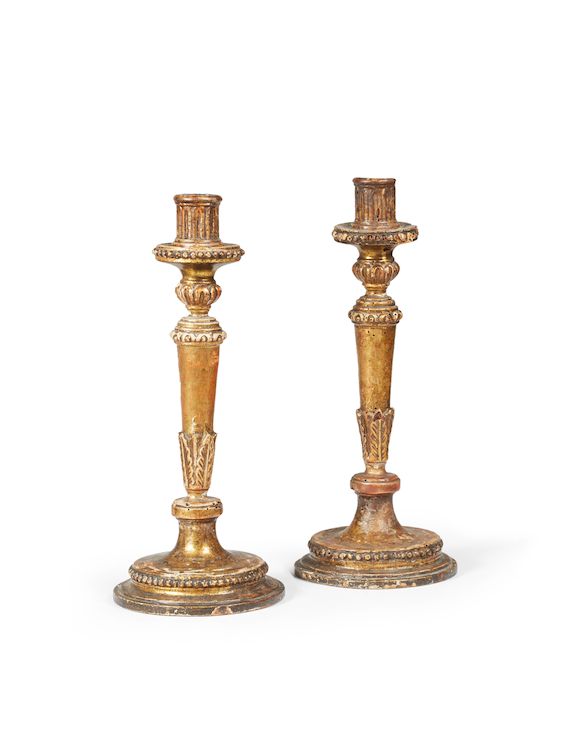 Bonhams : A pair of 18th century turned giltwood candlesticks, probably ...