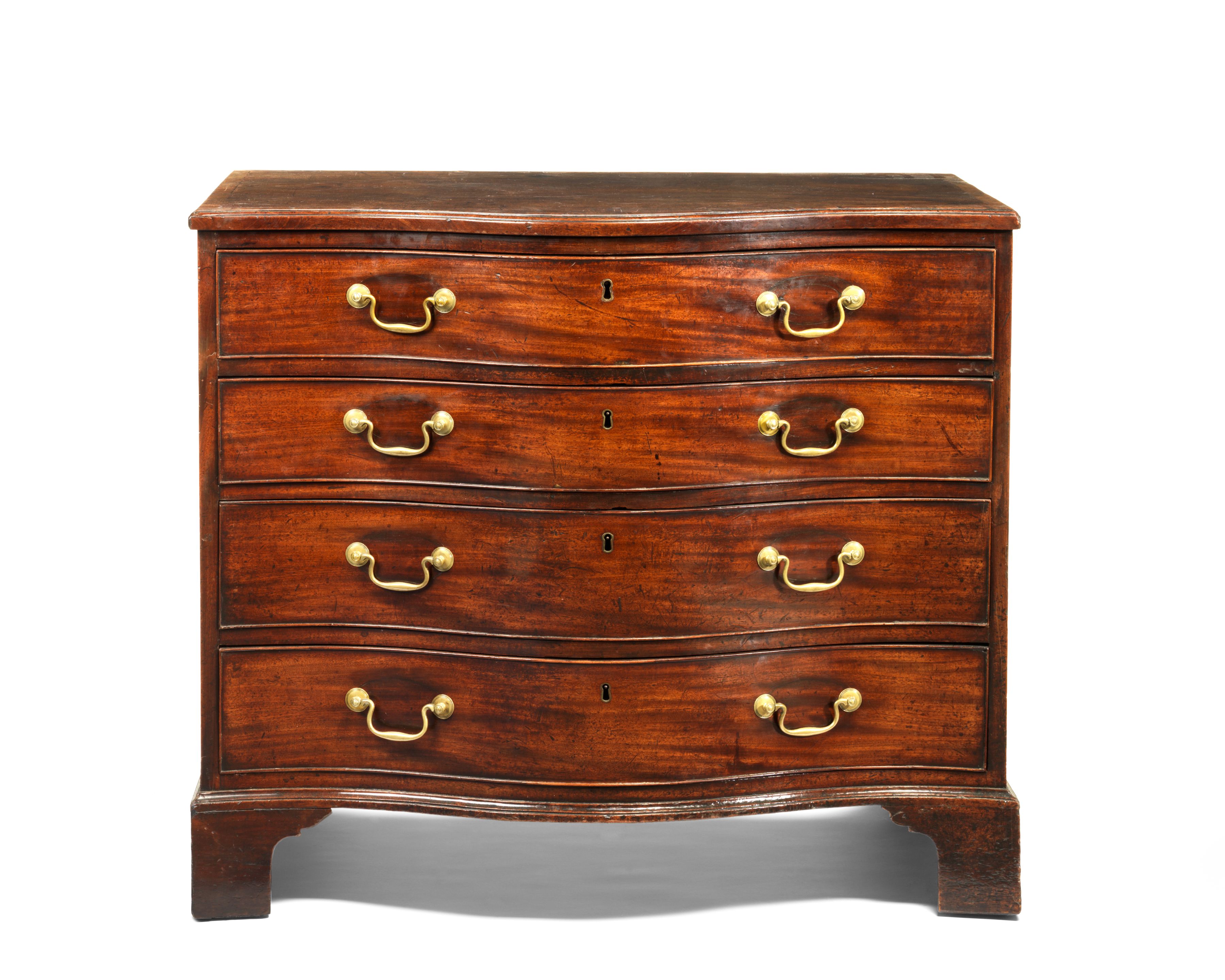 Bonhams : A George III mahogany and crossbanded serpentine dressing chest