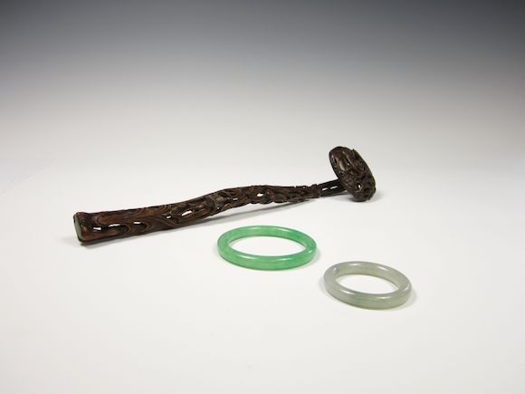 Bonhams : A carved wood sceptre and two jadeite bangles