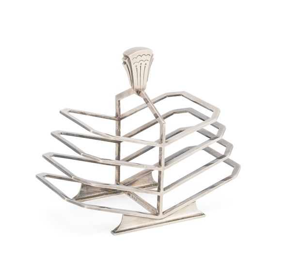Bonhams : ROBERT EDGAR STONE: An Art Deco silver toast rack London 1947 ...