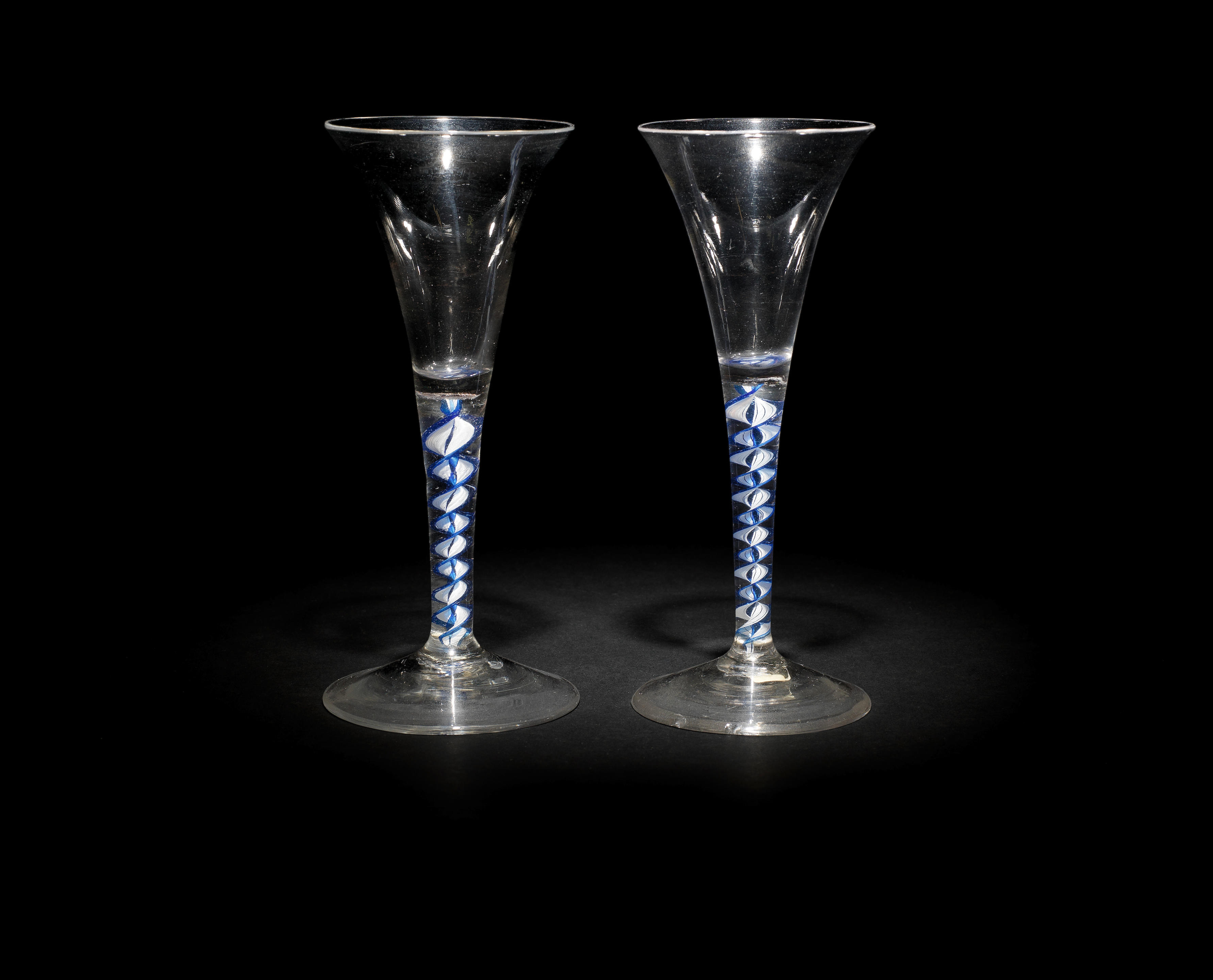 Bonhams A Pair Of Blue And White Colour Twist Wine Glasses Circa 1765