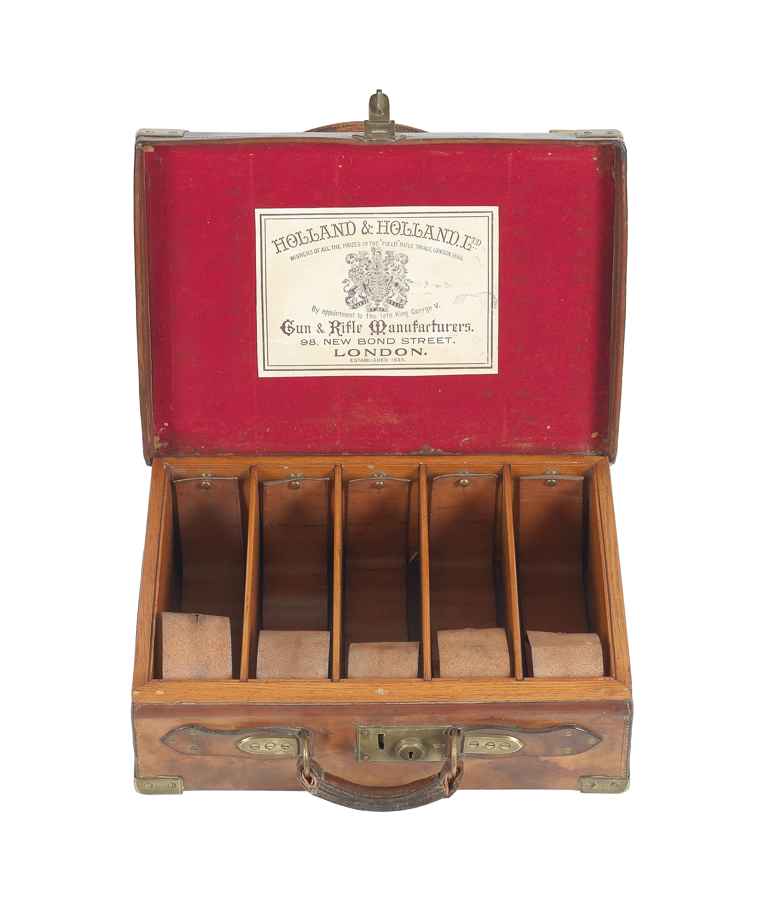 Bonhams : A brass-mounted leather cartridge-magazine