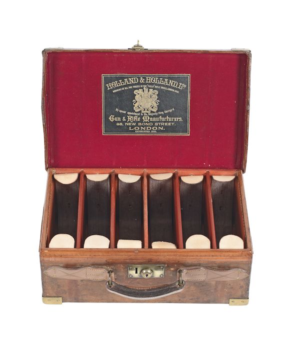 Bonhams : A brass-mounted leather cartridge-magazine