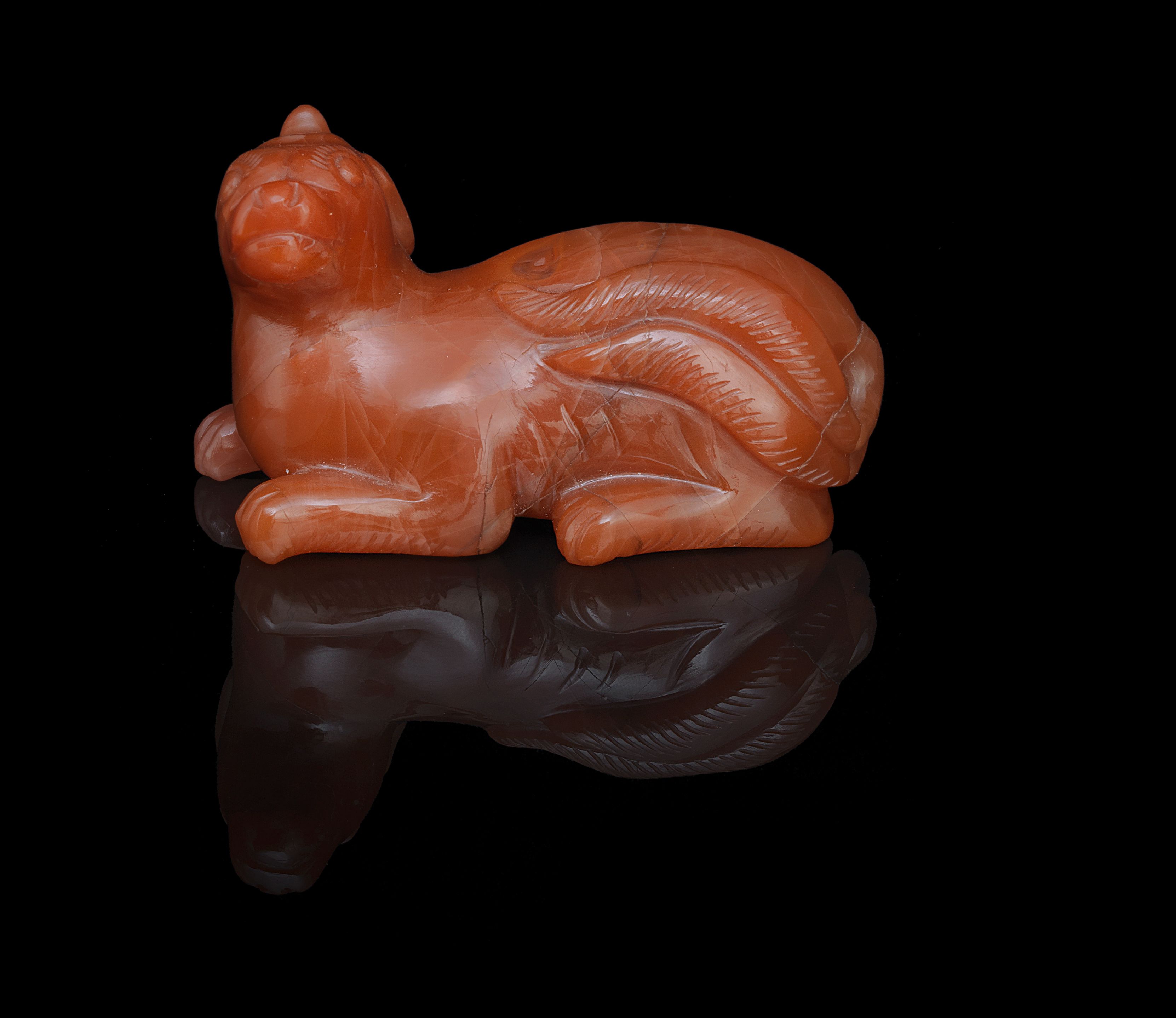 Bonhams : A fine carnelian agate carving of a recumbent mythical beast ...