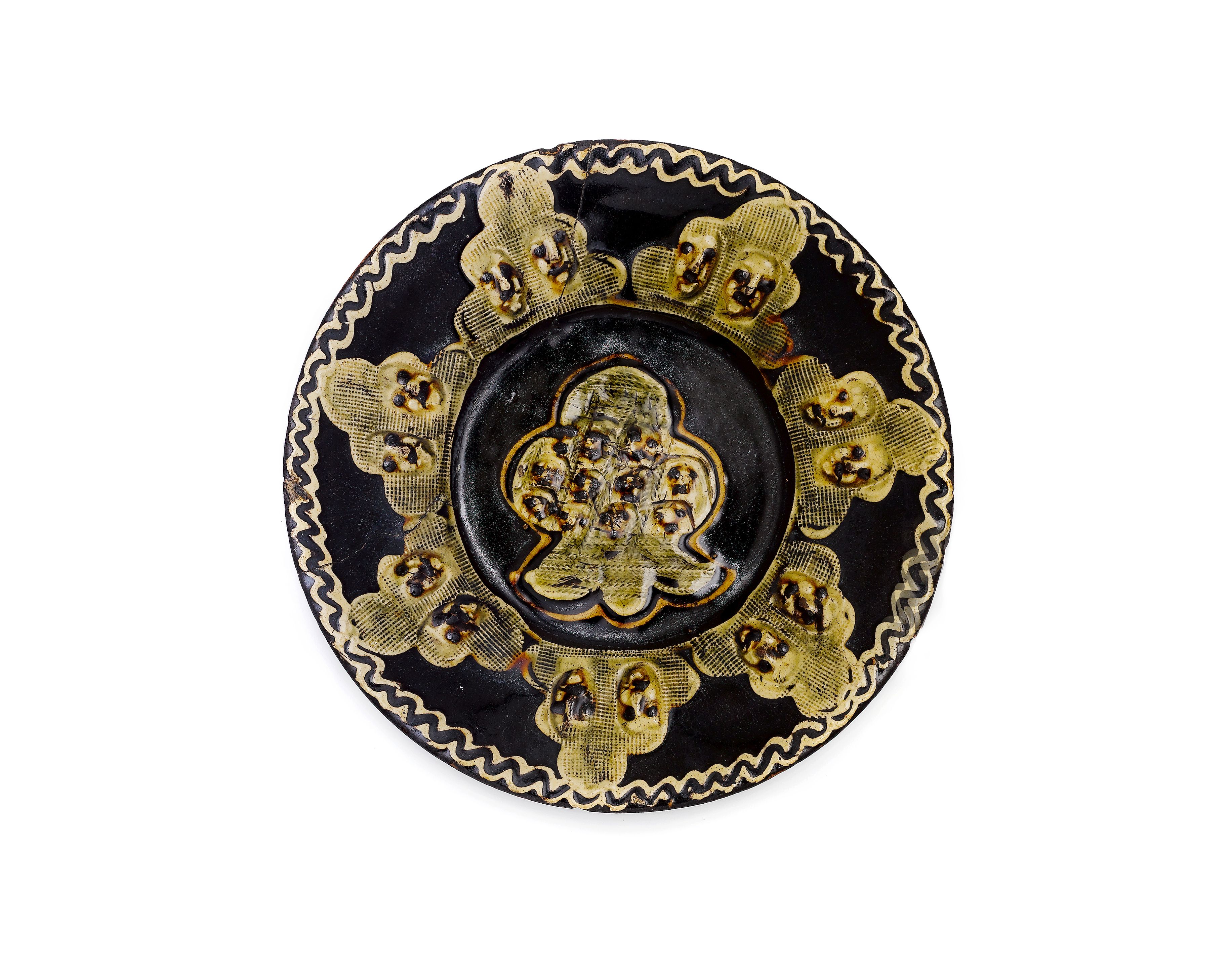 Bonhams : An unusual Staffordshire slipware dish, late 17th century