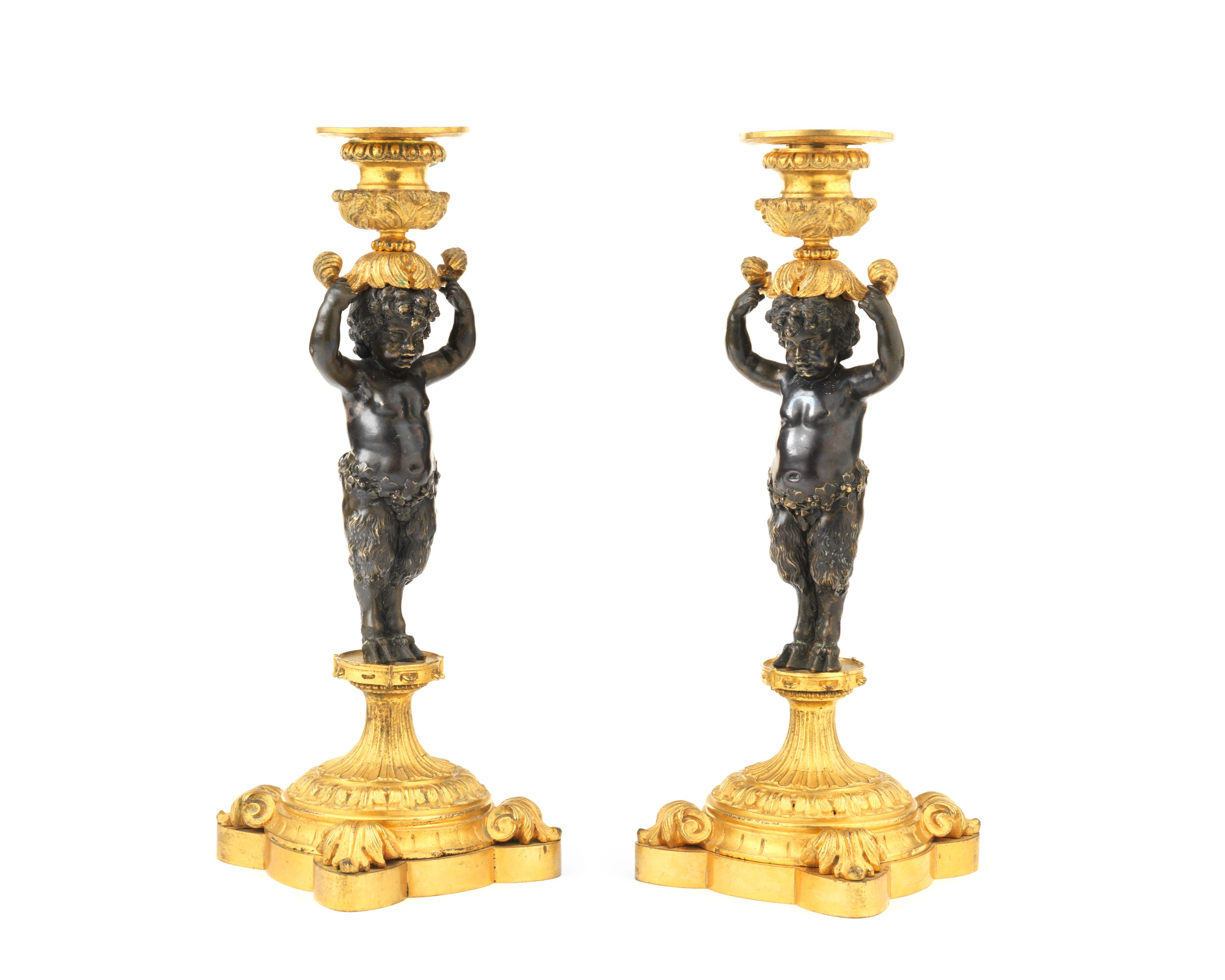 Bonhams : A pair of mid 19th century patinated and gilt bronze infant ...